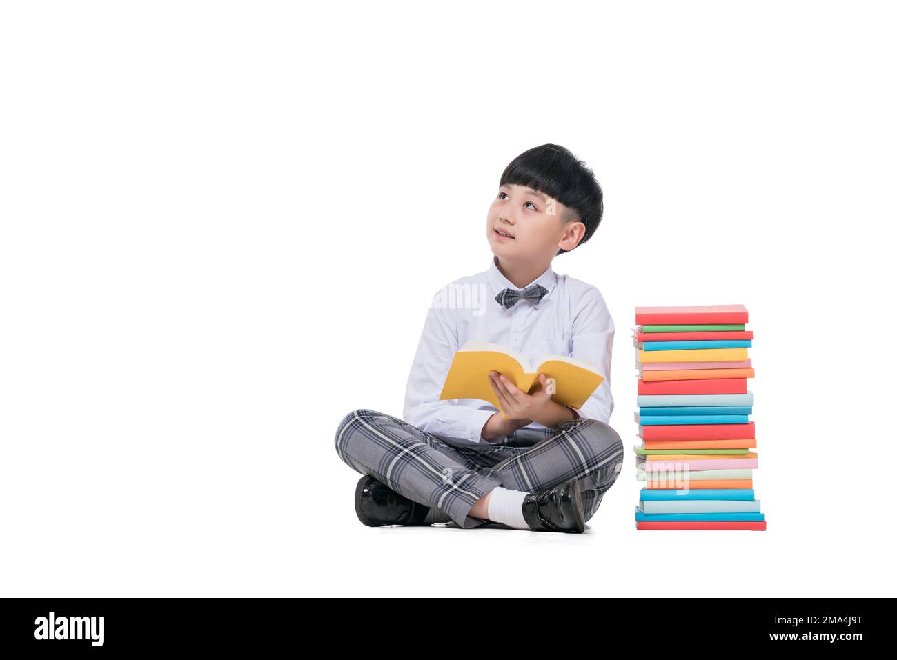 Happy primary school and books Stock Photo - Alamy