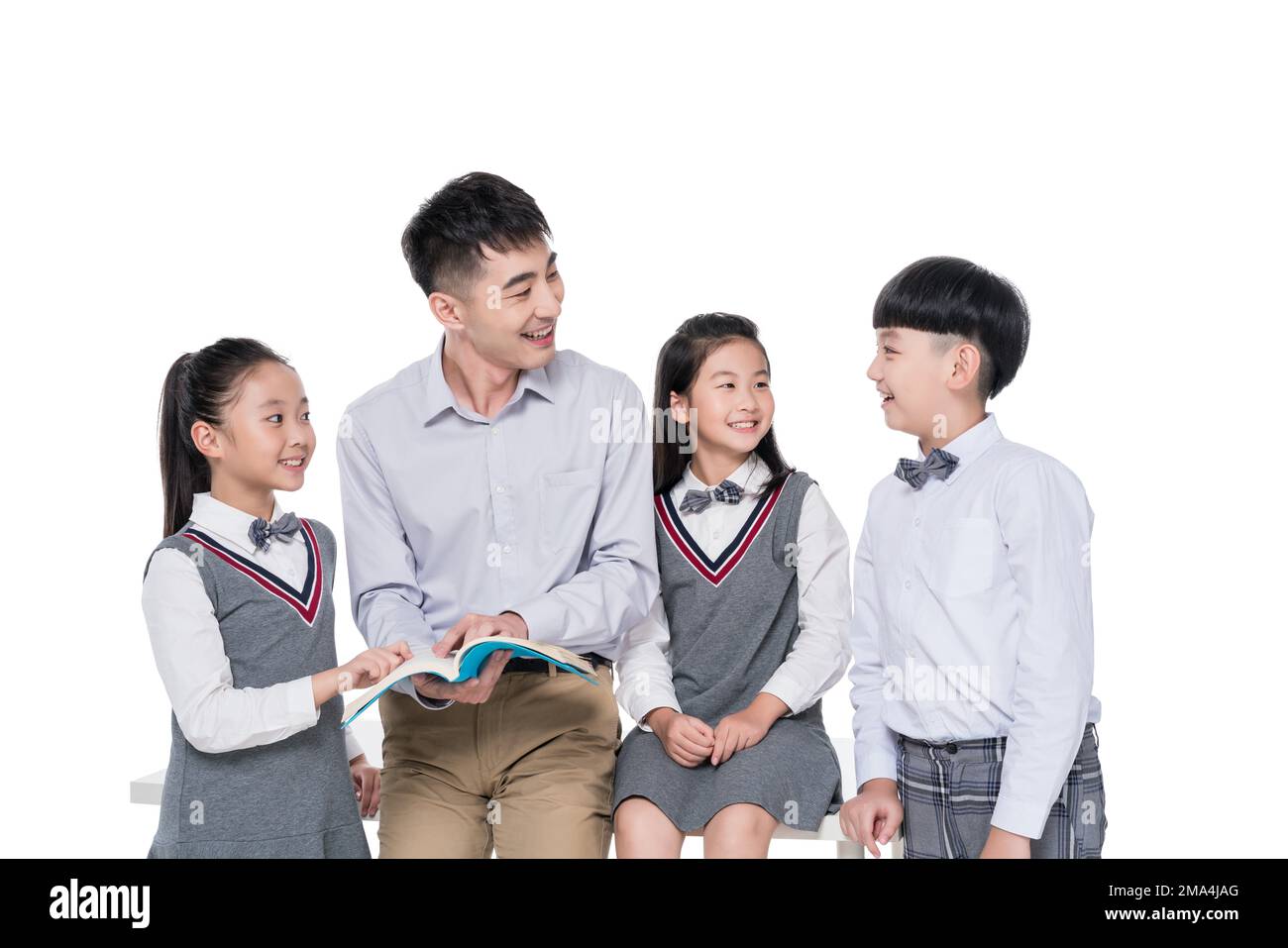 The teacher guiding students learning Stock Photo - Alamy