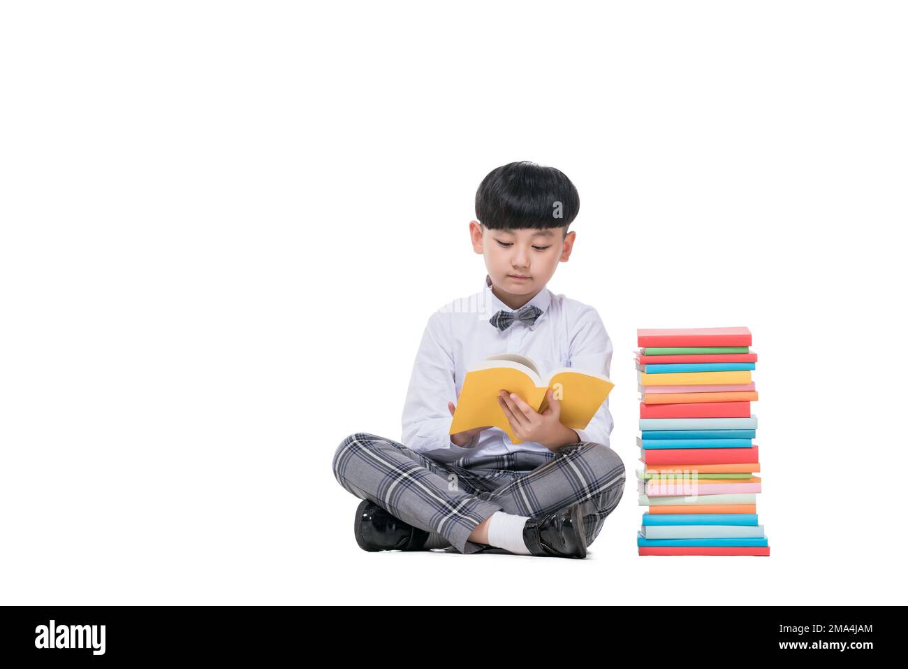 Happy primary school and books Stock Photo - Alamy