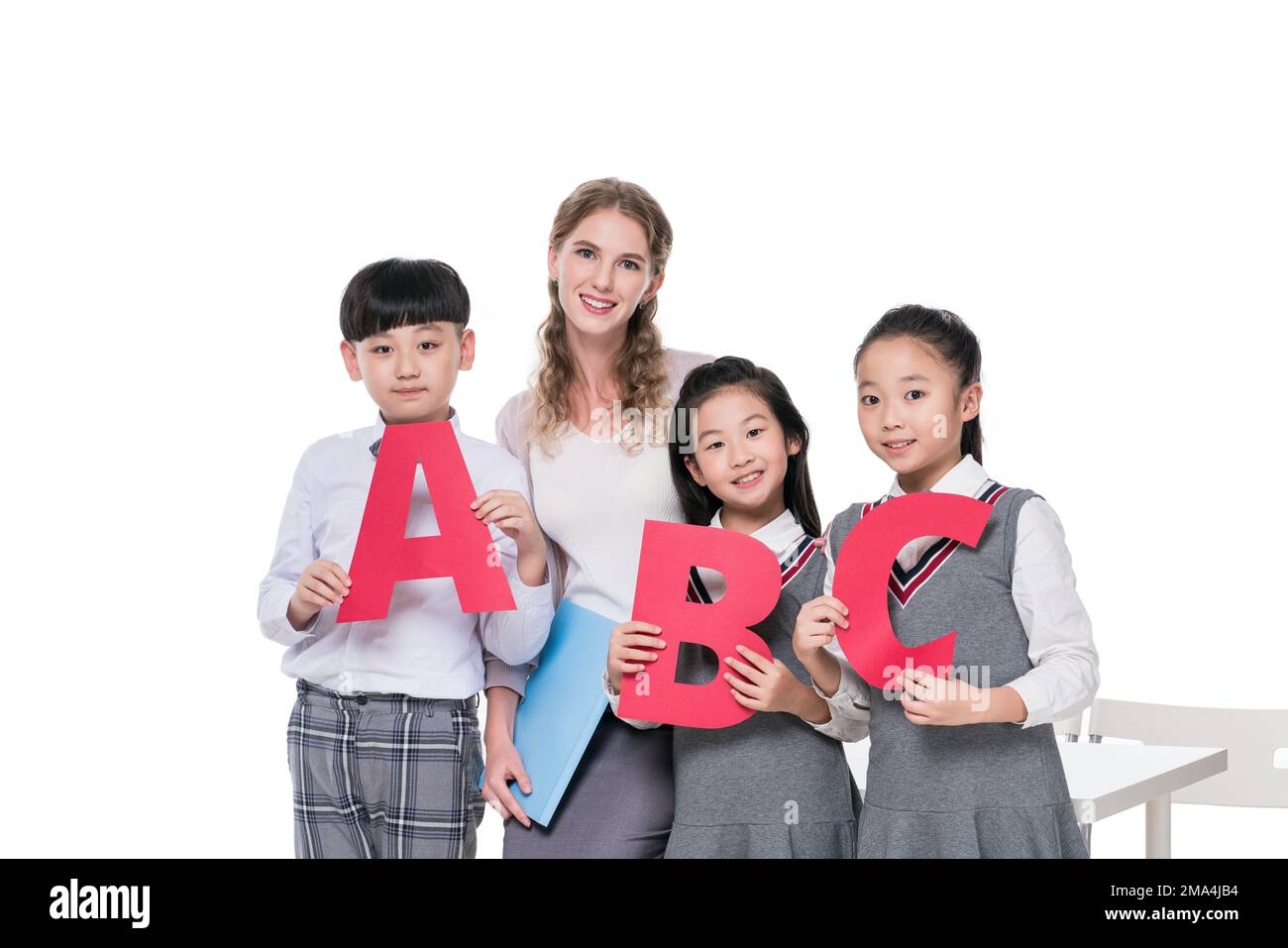 Female teachers guide students learning Stock Photo - Alamy