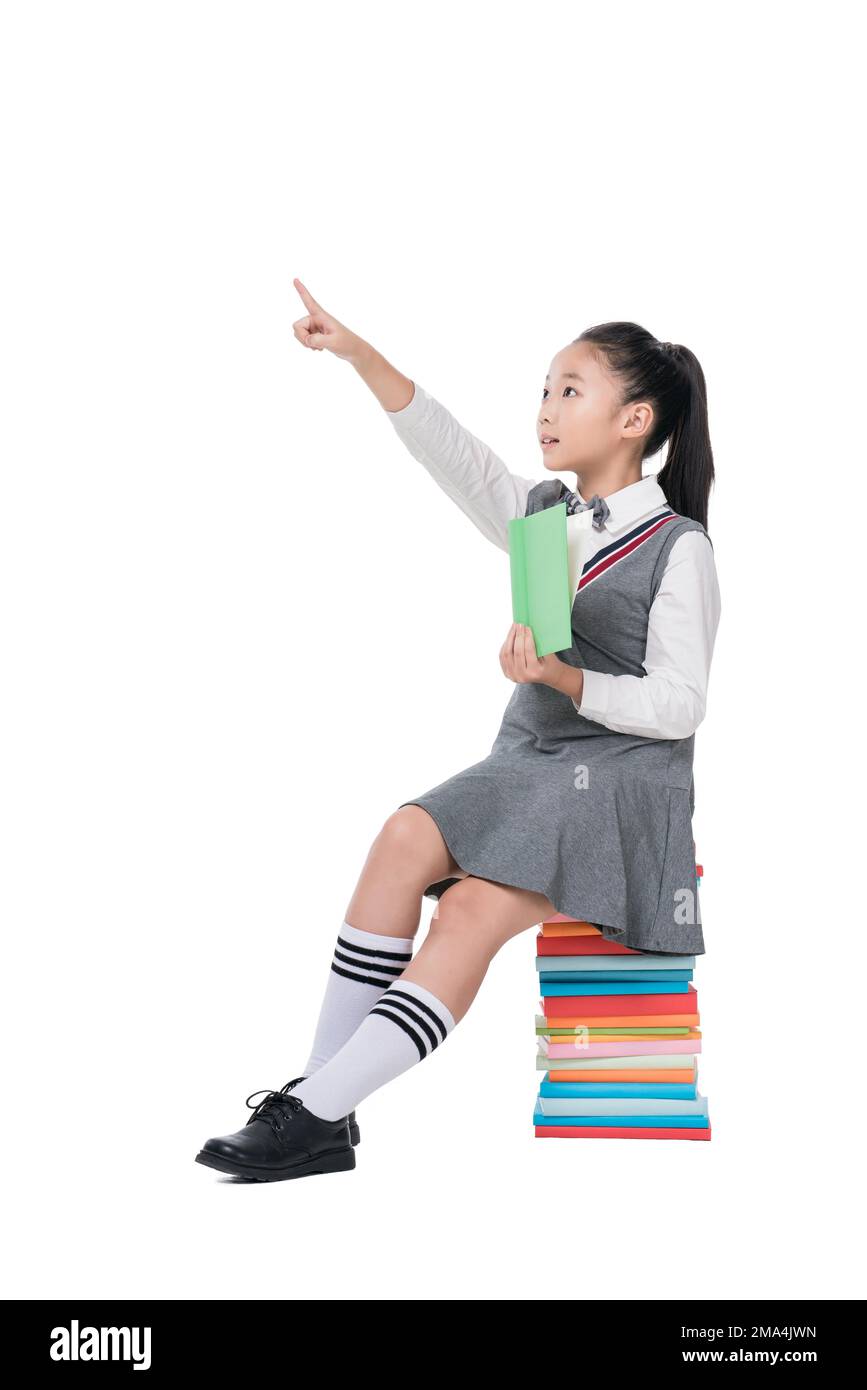 Happy primary school and books Stock Photo - Alamy