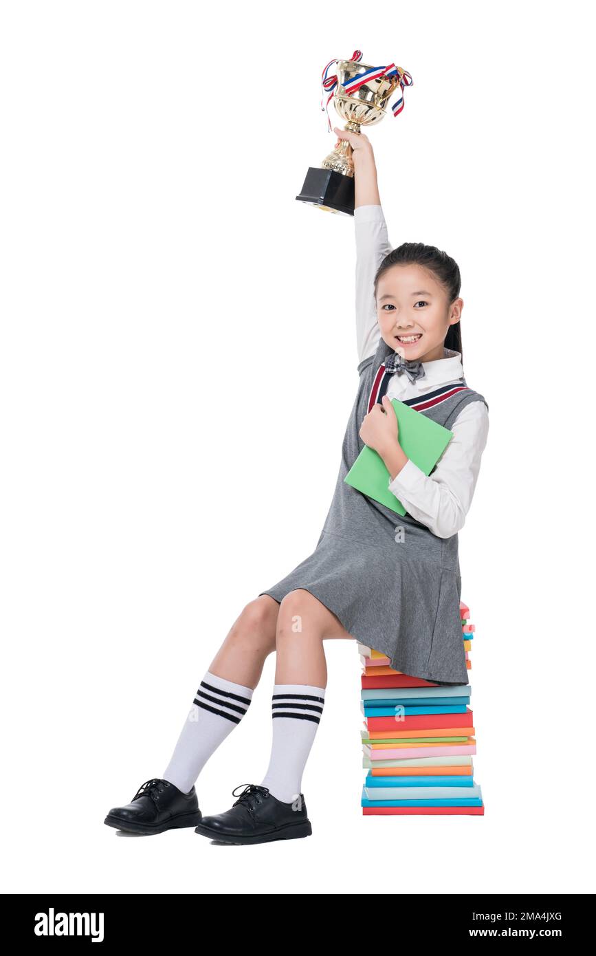 Happy primary school and books Stock Photo - Alamy