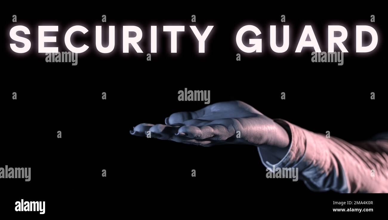 Hand writing sign Security Guard. Word Written on tools used to manage ...