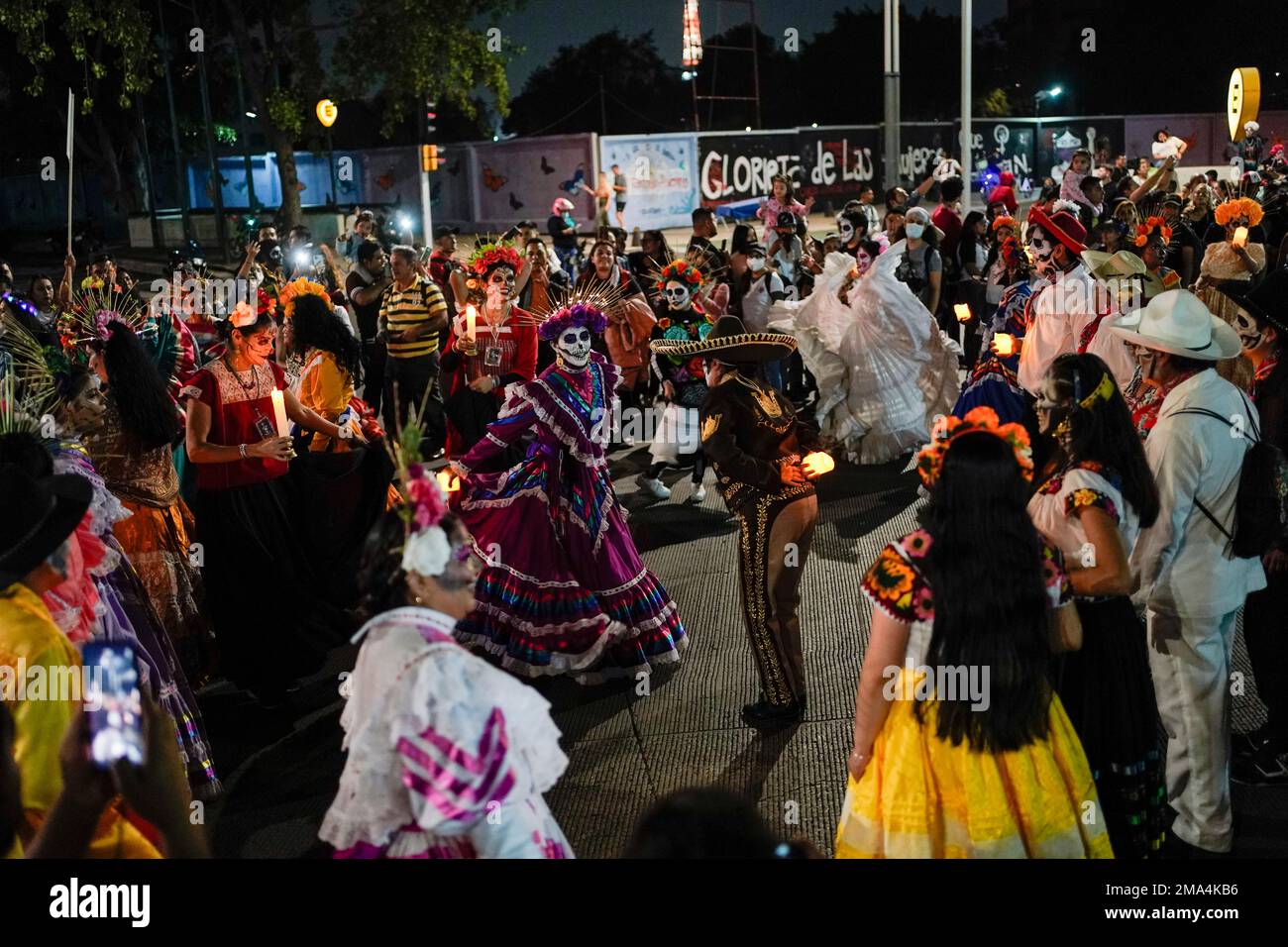 People dressed as Mexico's iconic "Catrinas" dance during the Grand ...