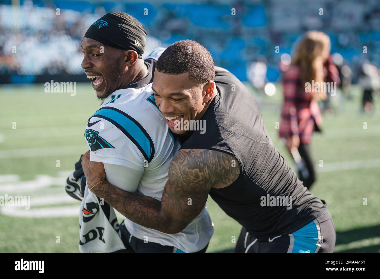 Carolina Panthers wide receiver DJ Moore, right, and quarterback PJ ...