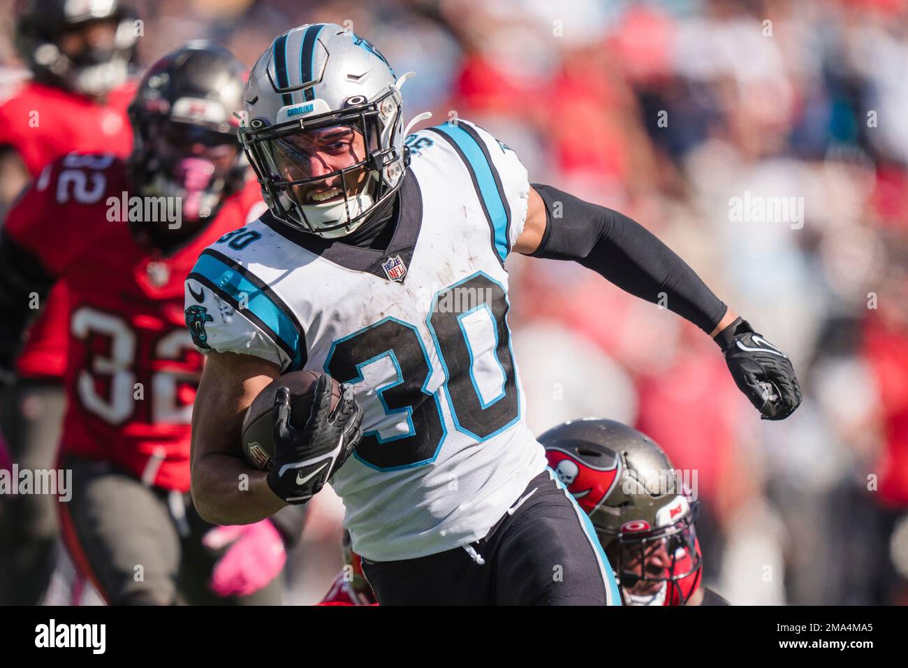 Carolina Panthers running back Chuba Hubbard (30) heads to the end zone ...
