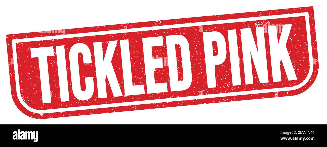 TICKLED PINK text written on red grungy stamp sign Stock Photo - Alamy
