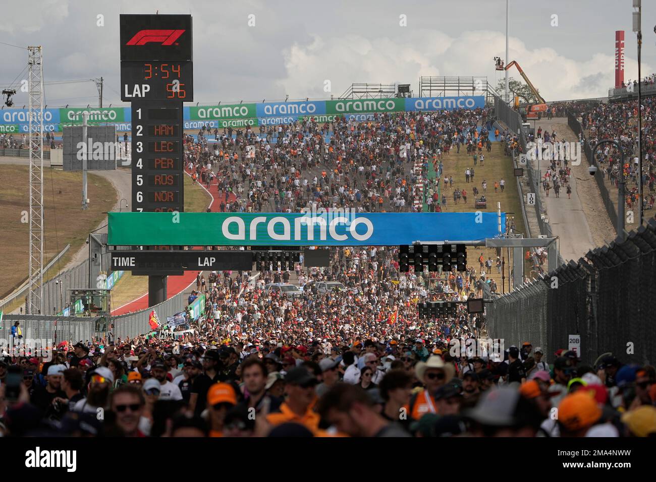 Fans fill the front stretch of the race track after the Formula One U.S ...
