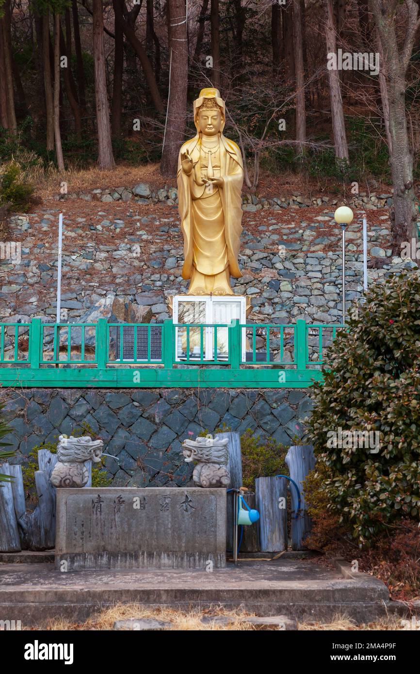 Golden Buddha statue at Janggunam temple. Busan, South Korea Stock ...