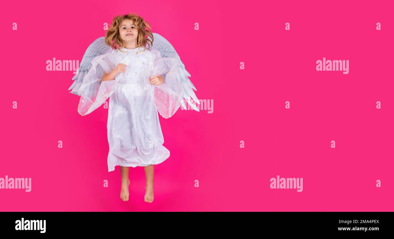 Little angel jump, kids jumping, full body. Little angel fly. Child at ...