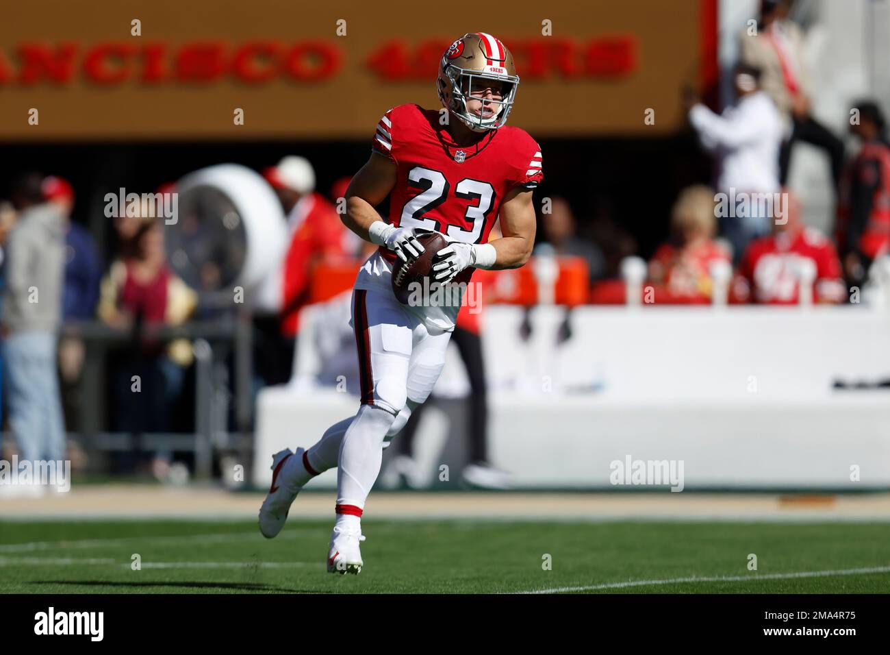 San Francisco 49ers running back Christian McCaffrey (23) warms up ...