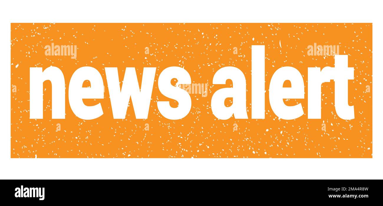 news alert text written on orange grungy stamp sign Stock Photo - Alamy