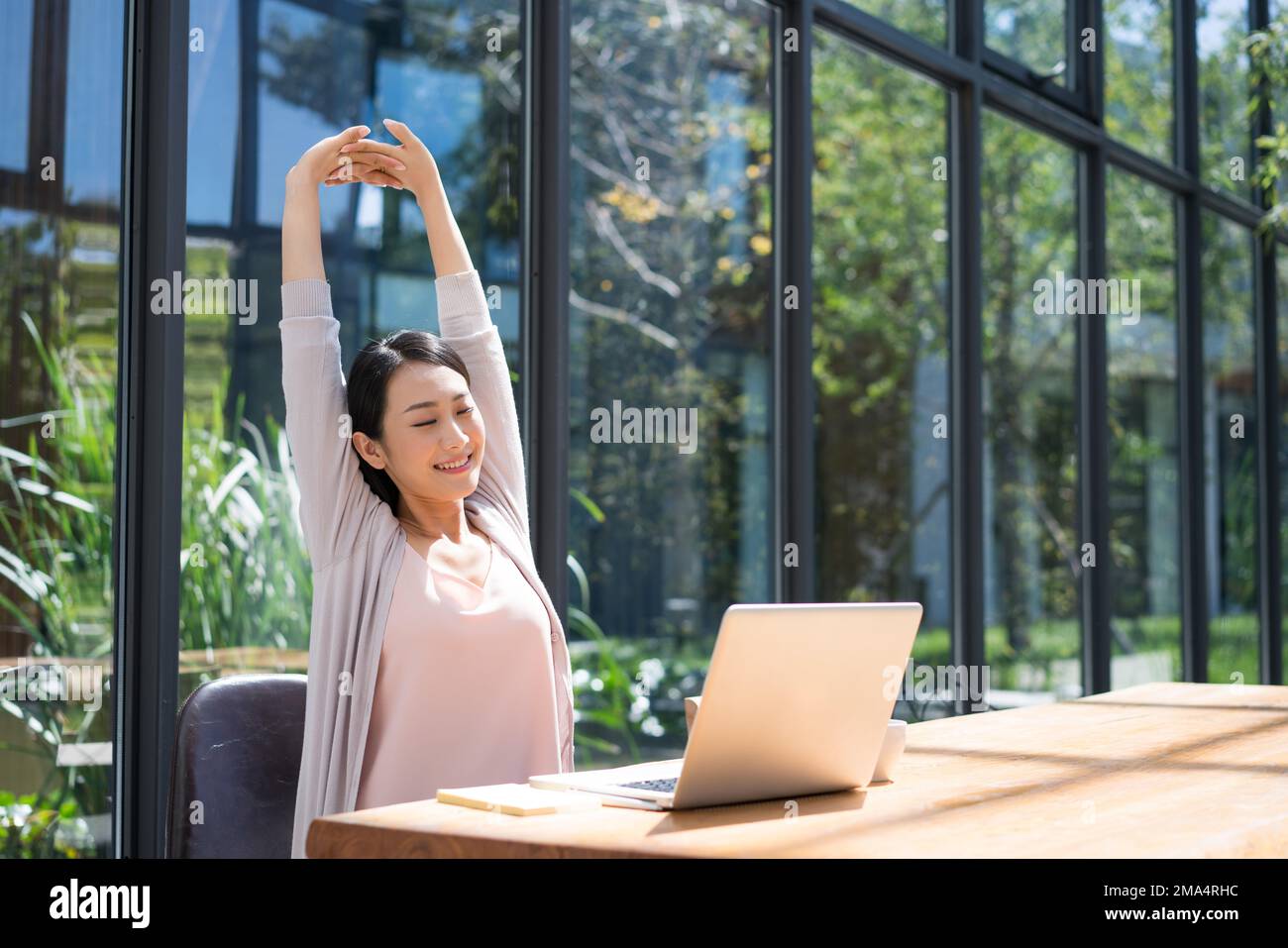 A young woman use the computer Stock Photo - Alamy