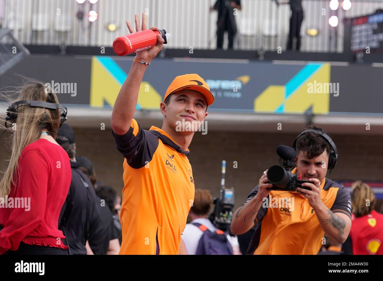 McLaren driver Lando Norris, of Britain, is introduced before the ...