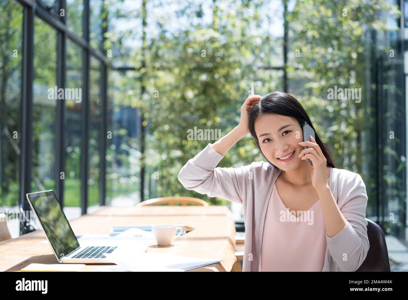 A young woman use the computer Stock Photo - Alamy