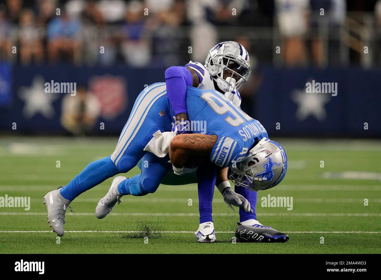Detroit Lions running back Craig Reynolds is stopped by Dallas Cowboys ...