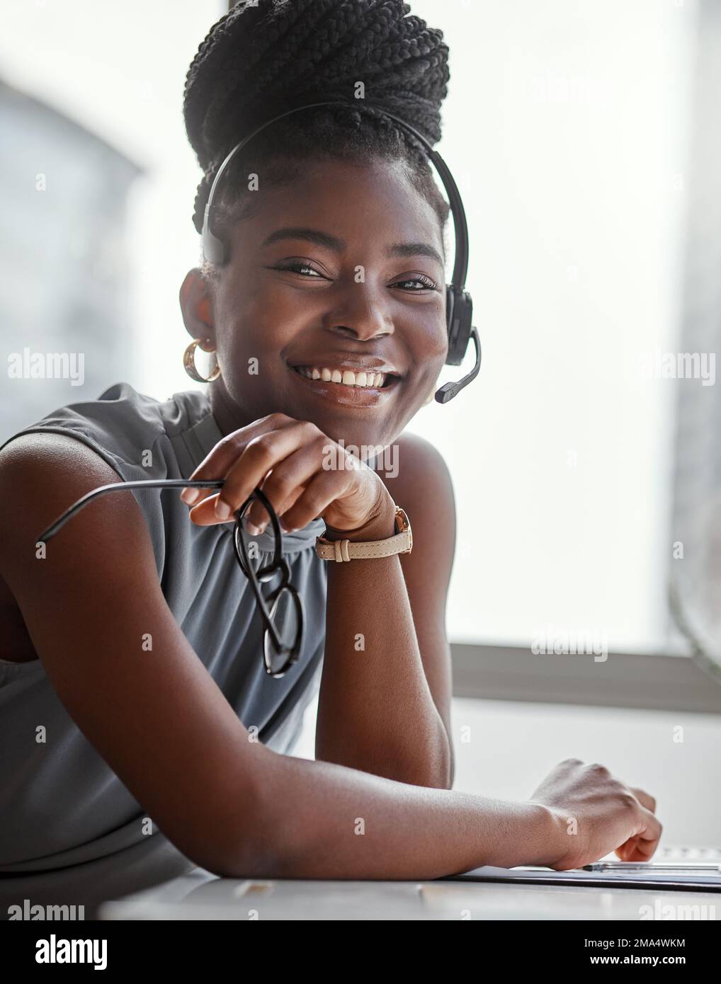 Woman putting on headset using hi-res stock photography and images - Alamy