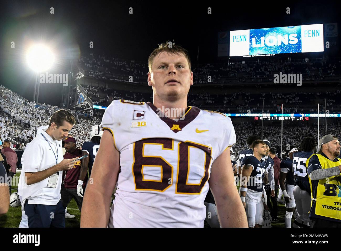 Minnesota offensive lineman John Michael Schmitz (60) leaves the field ...