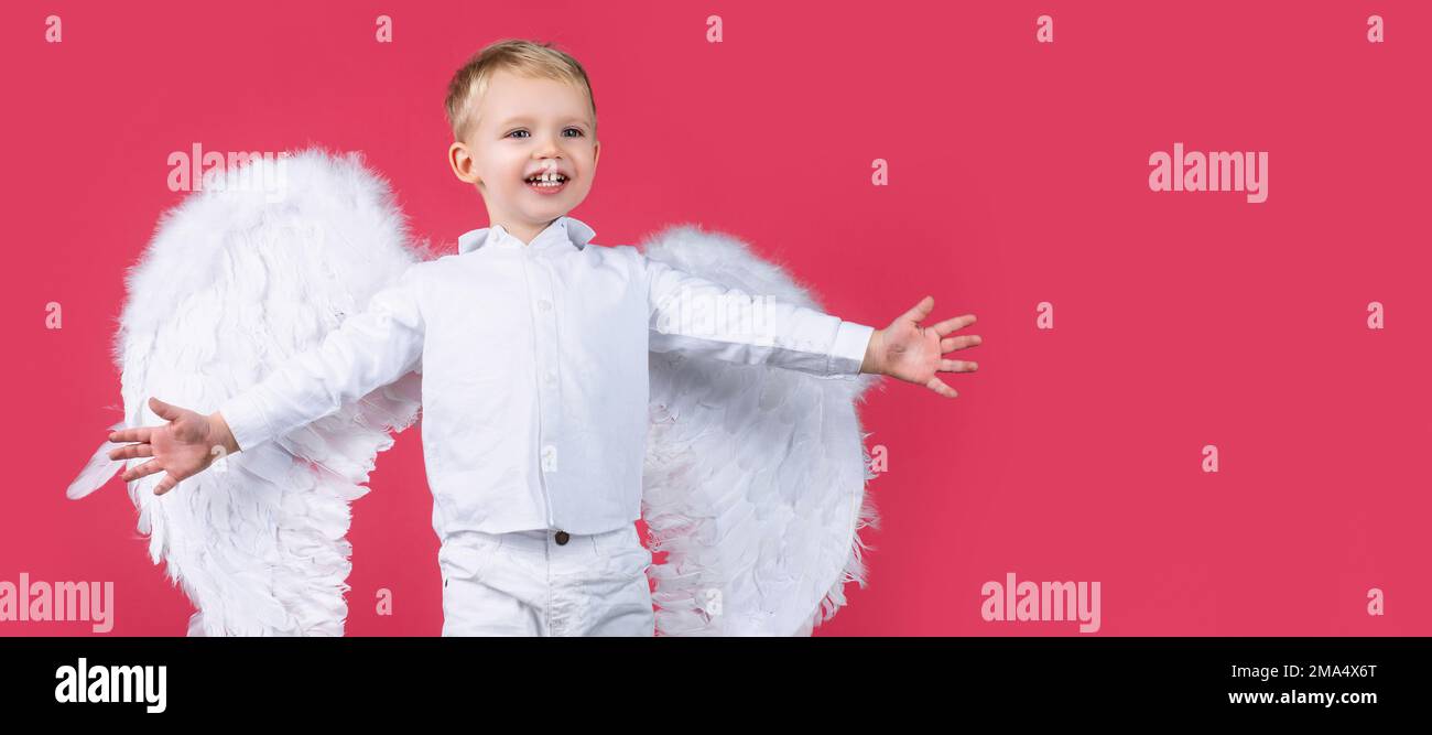 Angel child banner, isolated studio background. Happy smiling little ...