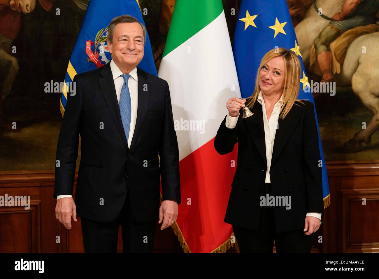 New Italian Premier Giorgia Meloni, right, flanked by outgoing Premier ...