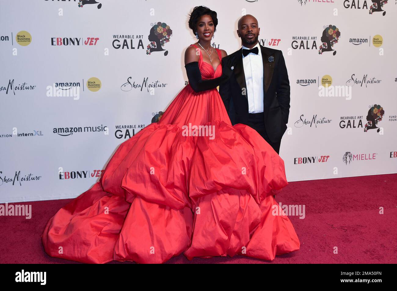 Kelly Rowland, left, and Tim Weatherspoon arrive at the 5th annual ...