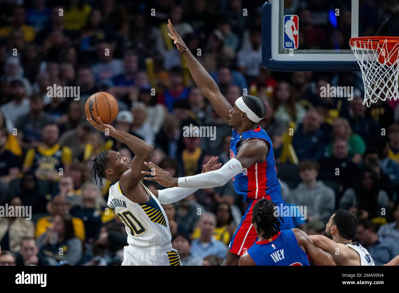 Indiana Pacers guard Bennedict Mathurin (00) shoots while being ...