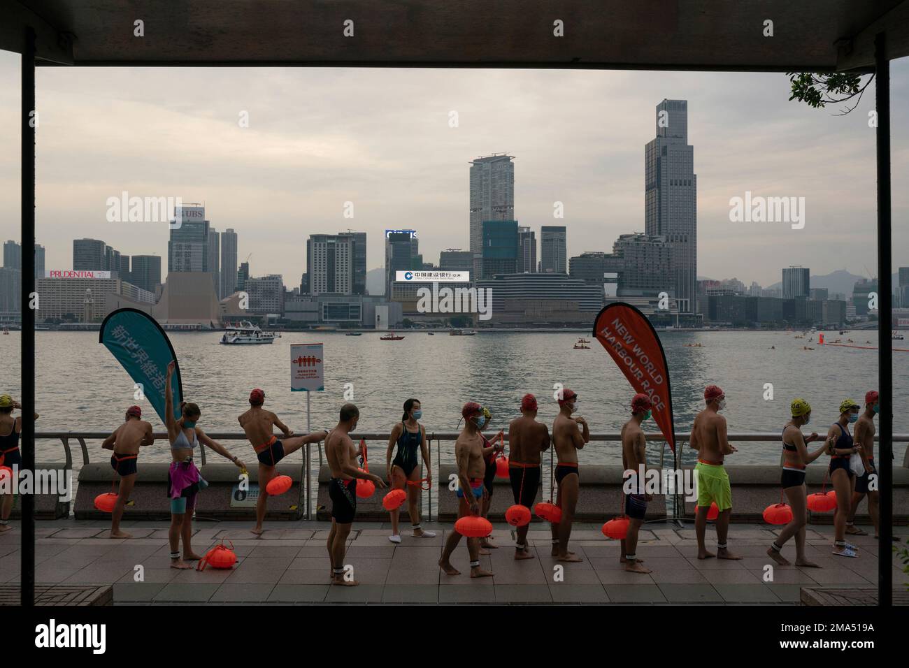 Swimmers wait at the start ahead of the annual harbor race at the ...