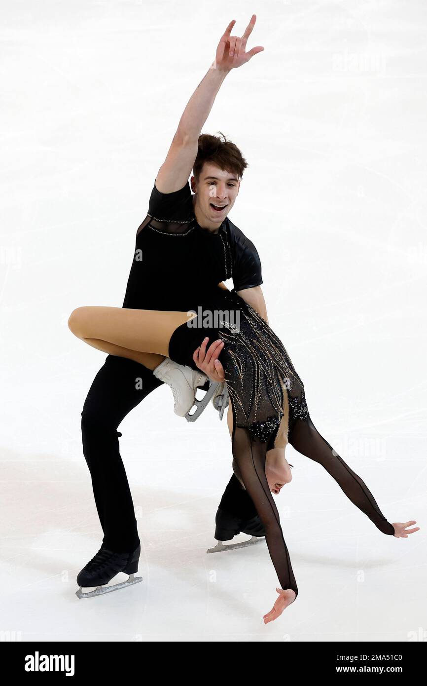 Kelly Ann Laurin and Loucas Ethier perform in the pairs short program ...