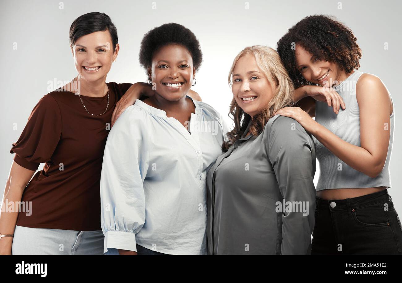Bringing girl power back. a diverse group of women standing close ...