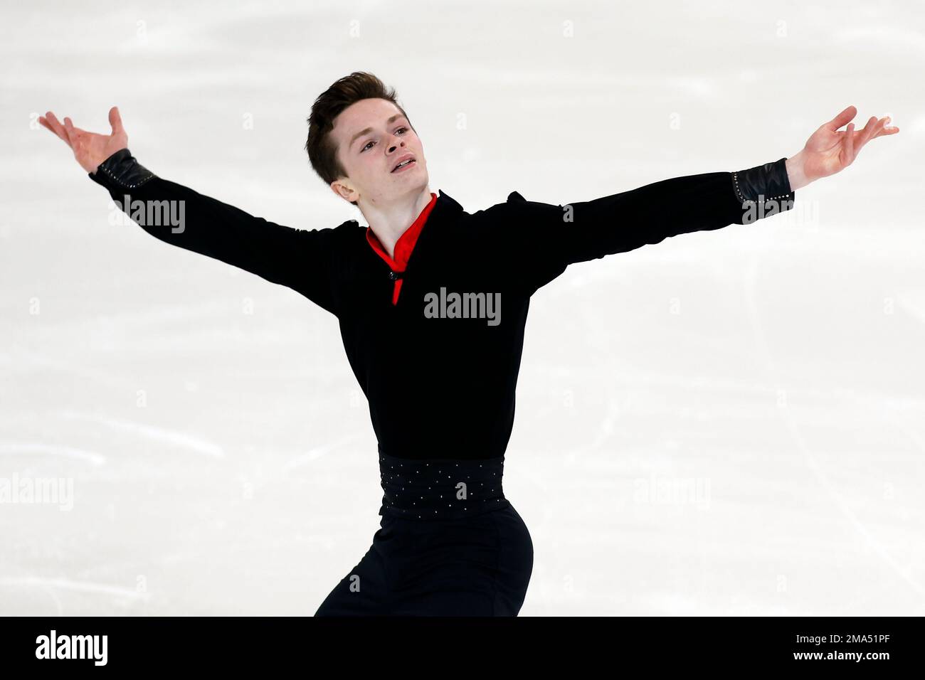 Liam Kapeikis performs in the mens short program during the Grand Prix ...