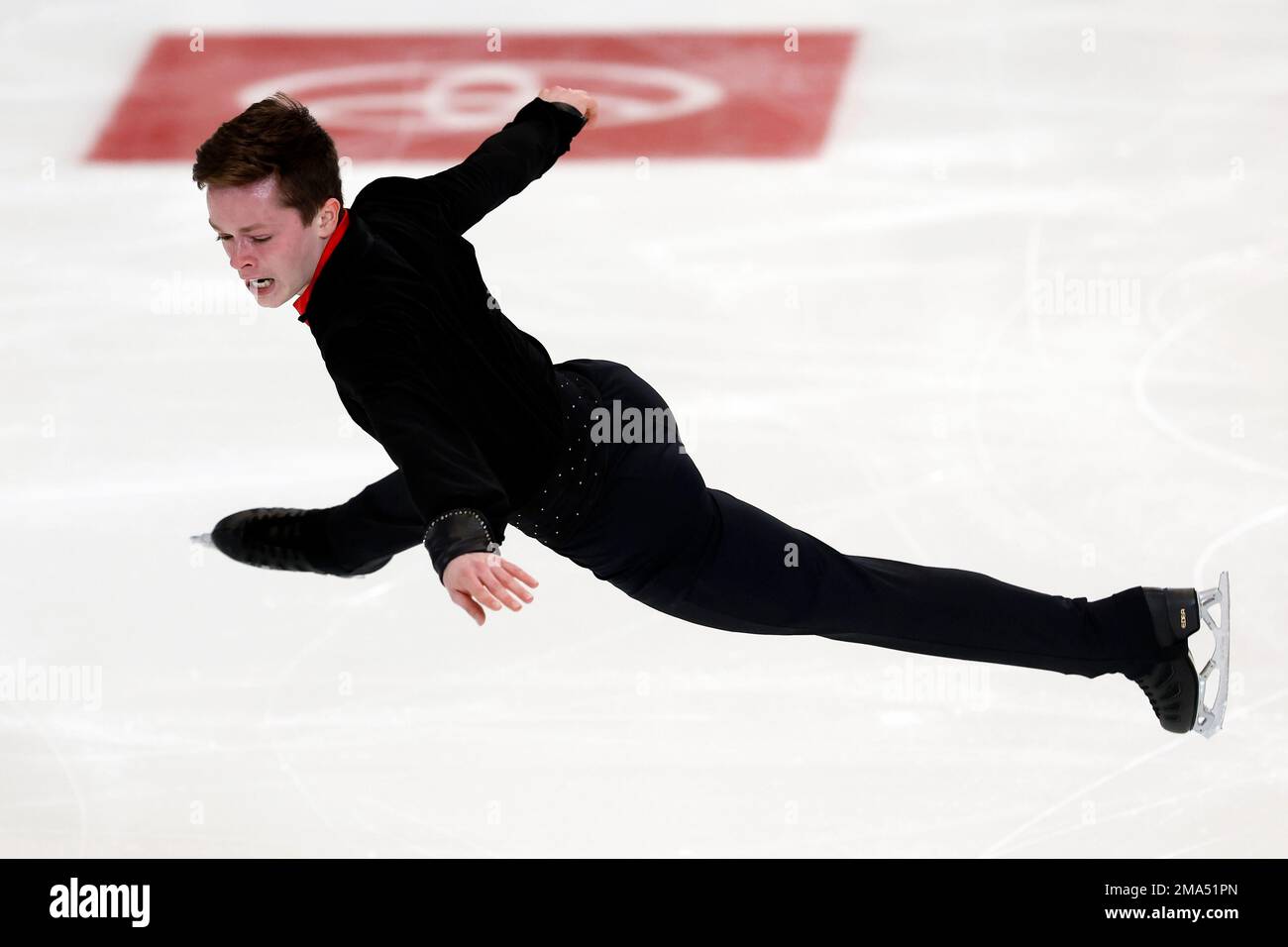 Liam Kapeikis performs in the mens short program during the Grand Prix ...
