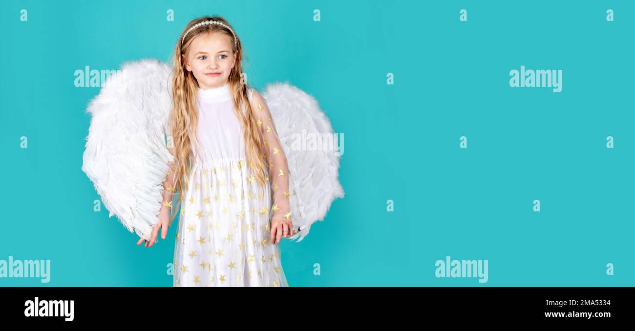 Angel kid banner, isolated studio background. Looks like an angel. Face ...
