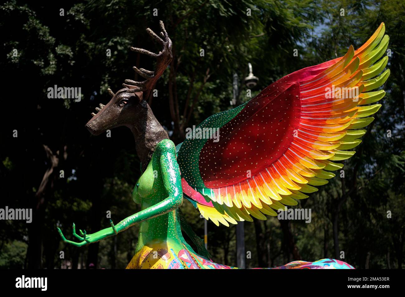 A giant alebrije is paraded through the historic center of Mexico City ...