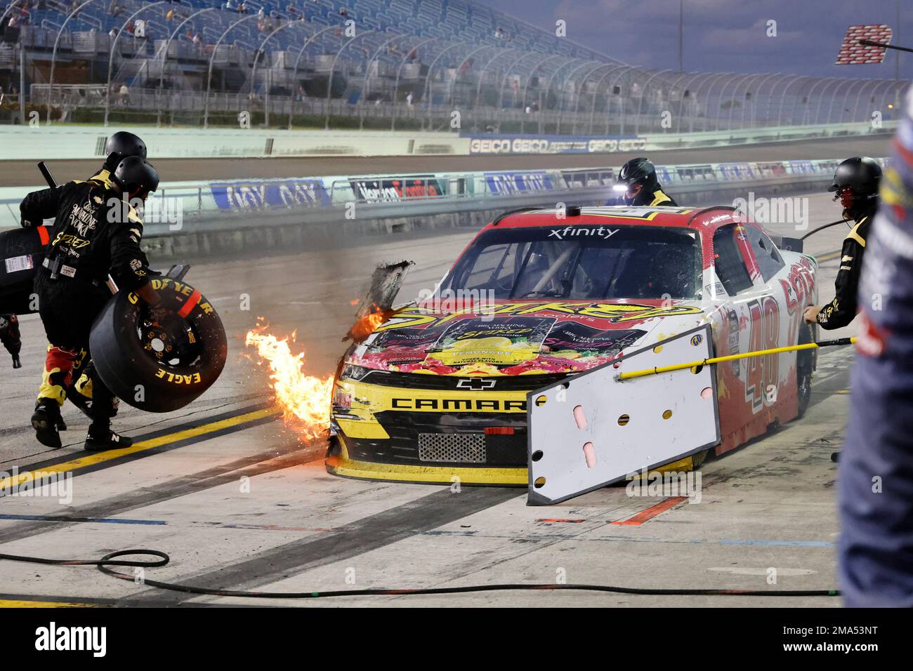 Nicholas Sanchez' car catches on fire during a pit stop at the NASCAR ...
