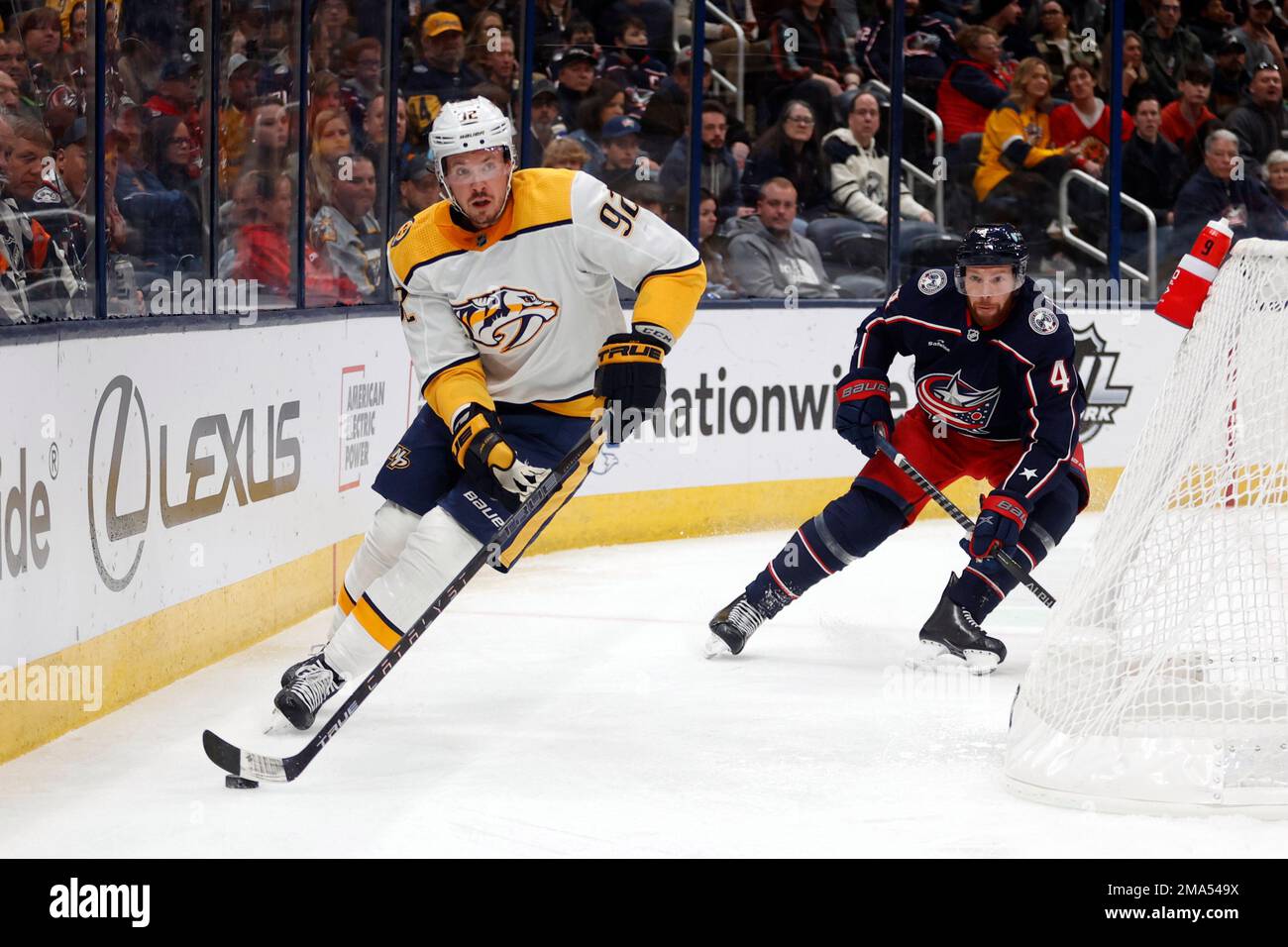 Nashville Predators forward Ryan Johansen, left, controls the puck in ...
