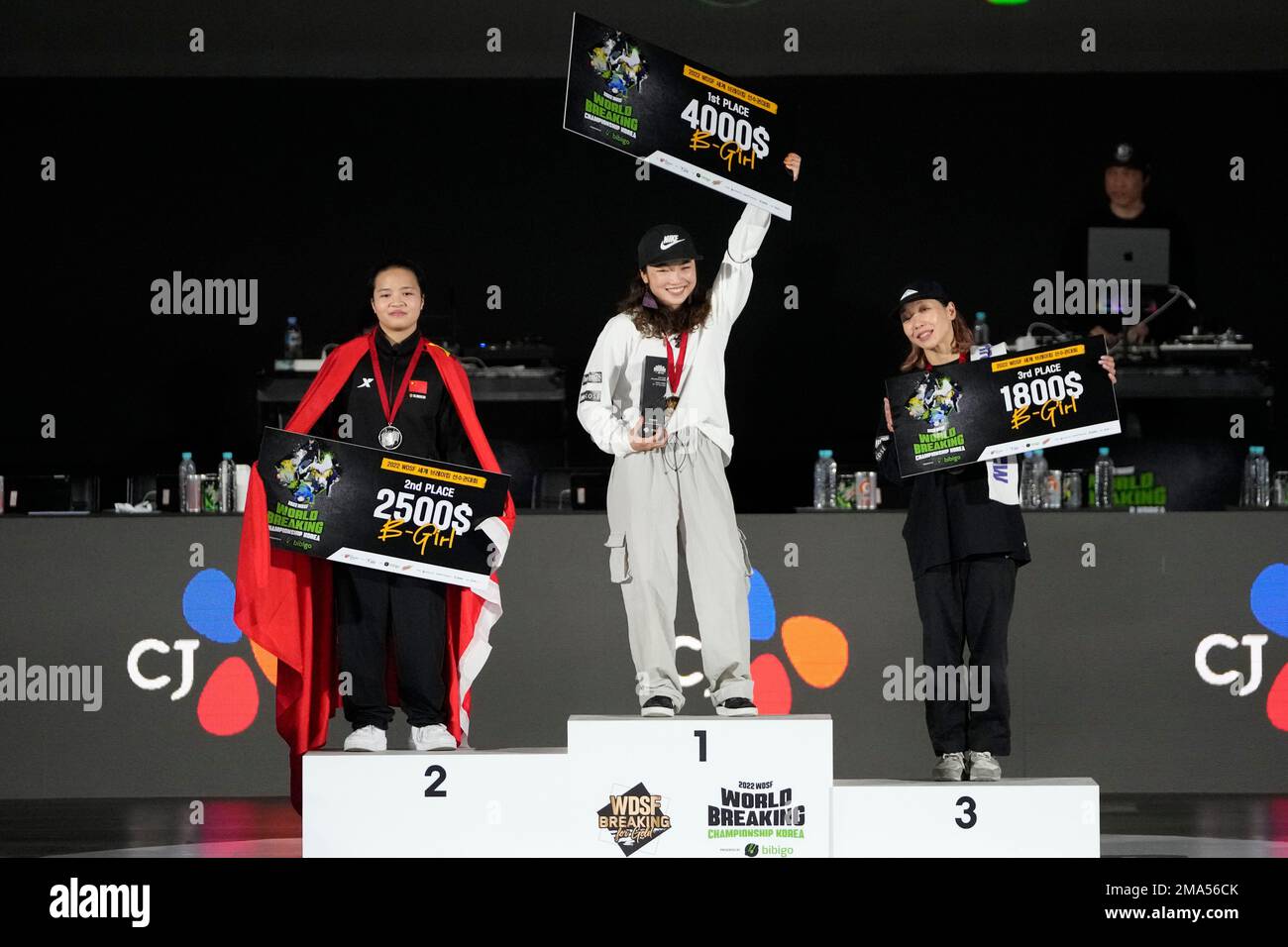 Winner Ami Yuasa of Japan, known as B-girl Ami, center, celebrates with ...