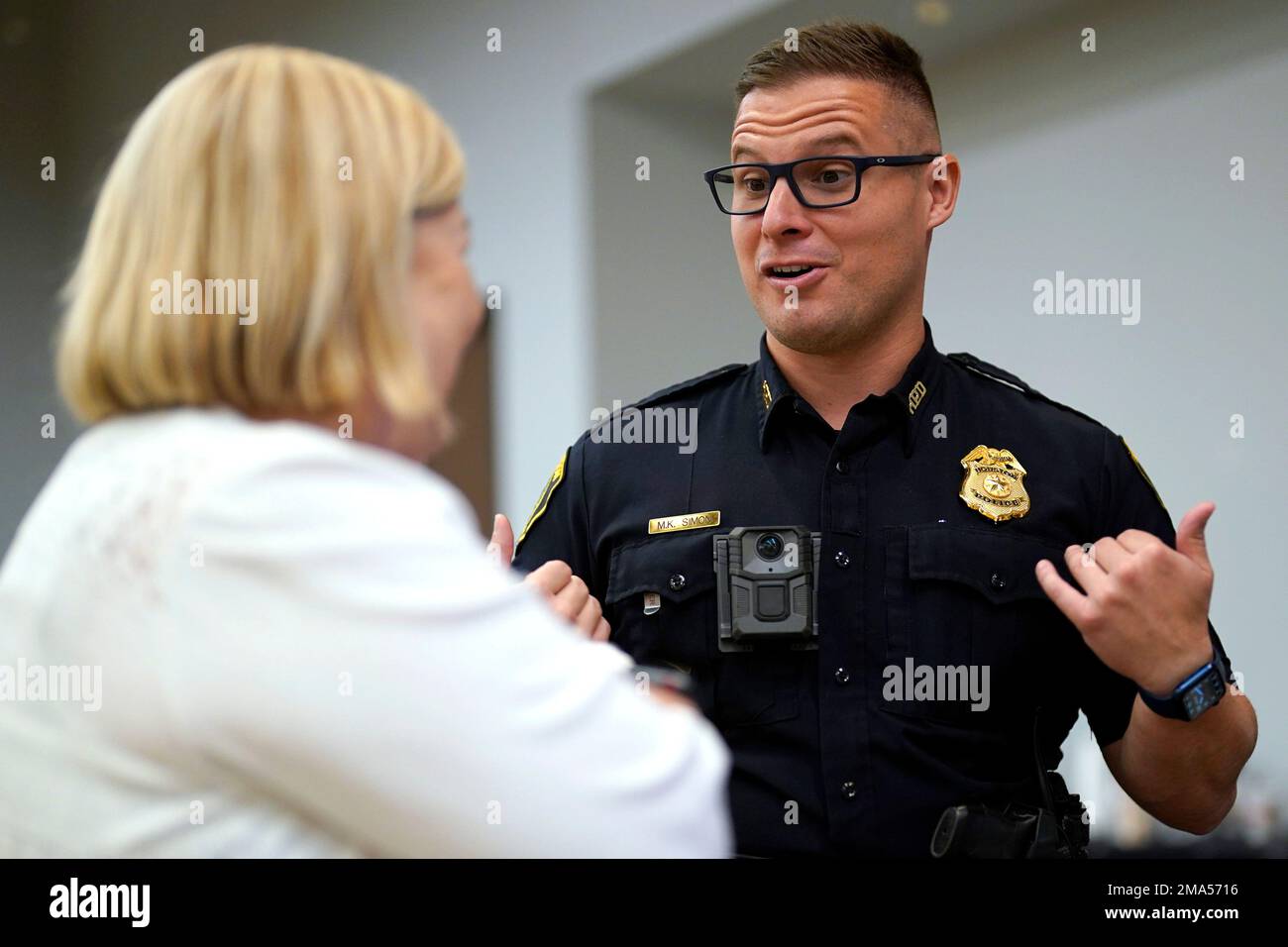 Houston Police Officer Matthew Simon, right, with the Special ...