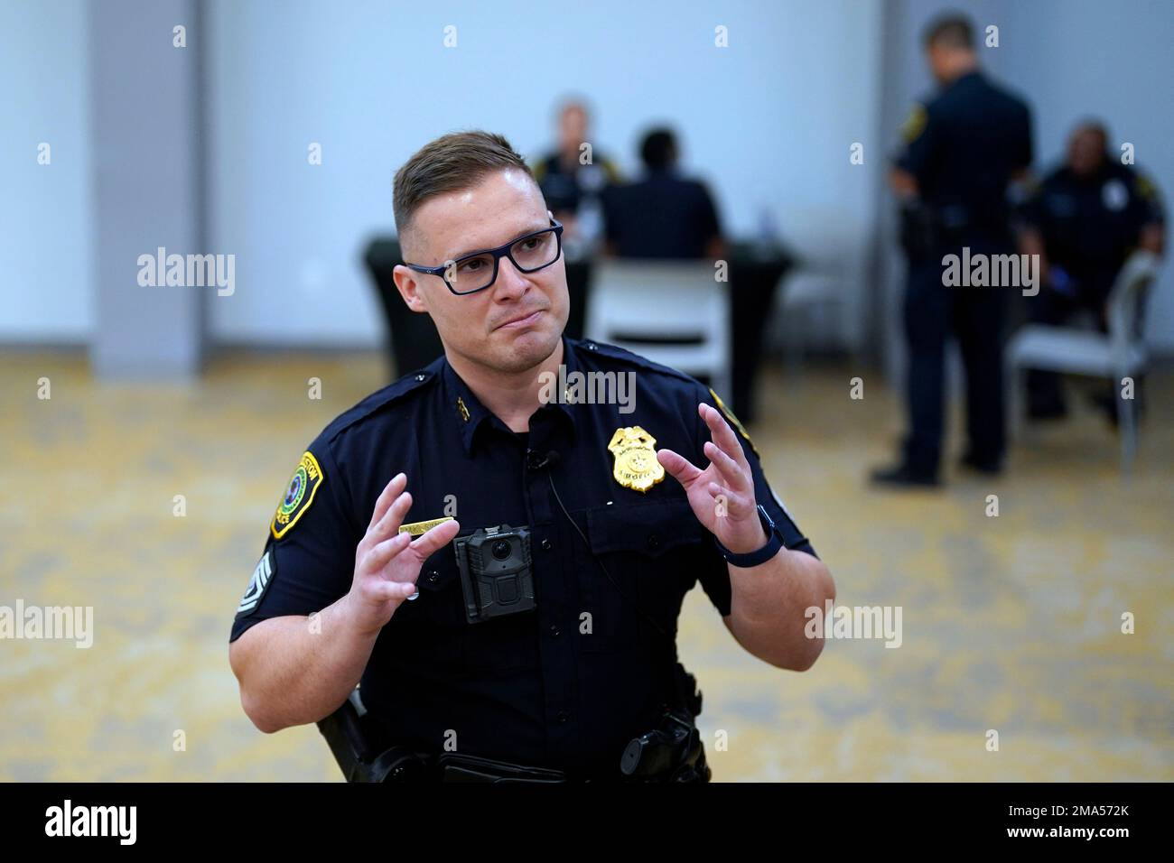 Houston Police Officer Matthew Simon, right, with the Special ...