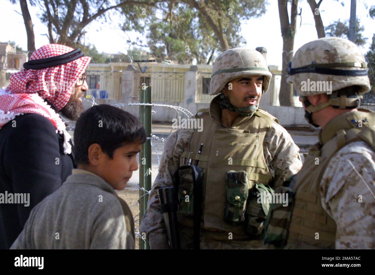 041227-M-2353F-018. [Complete] Scene Caption: U.S. Marine Corps LT. COL ...