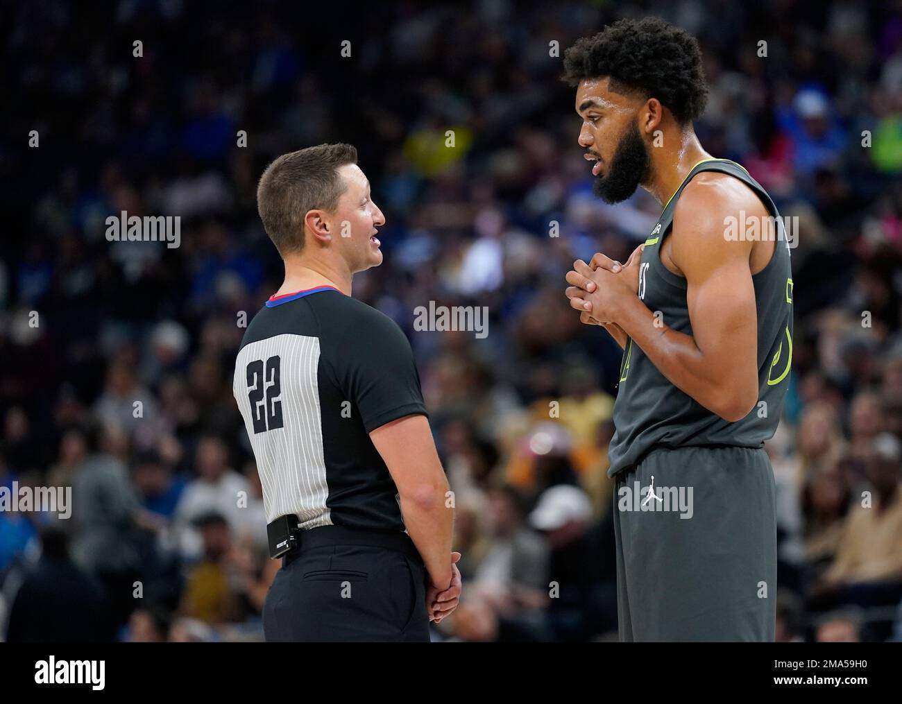 Minnesota Timberwolves center Karl-Anthony Towns, right, speaks with ...