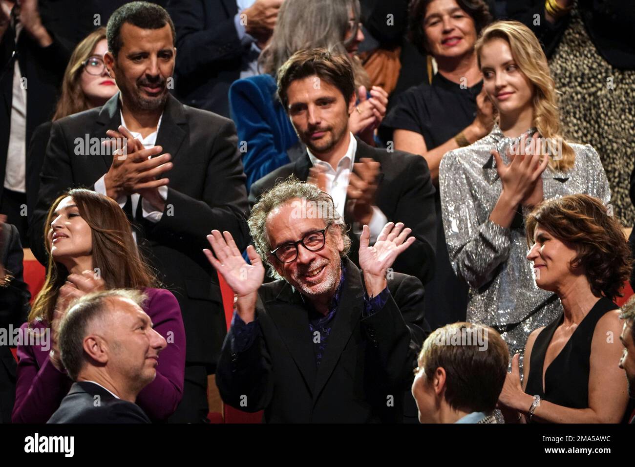 US Director Tim Burton, center, reacts as he arrives at the 14th ...