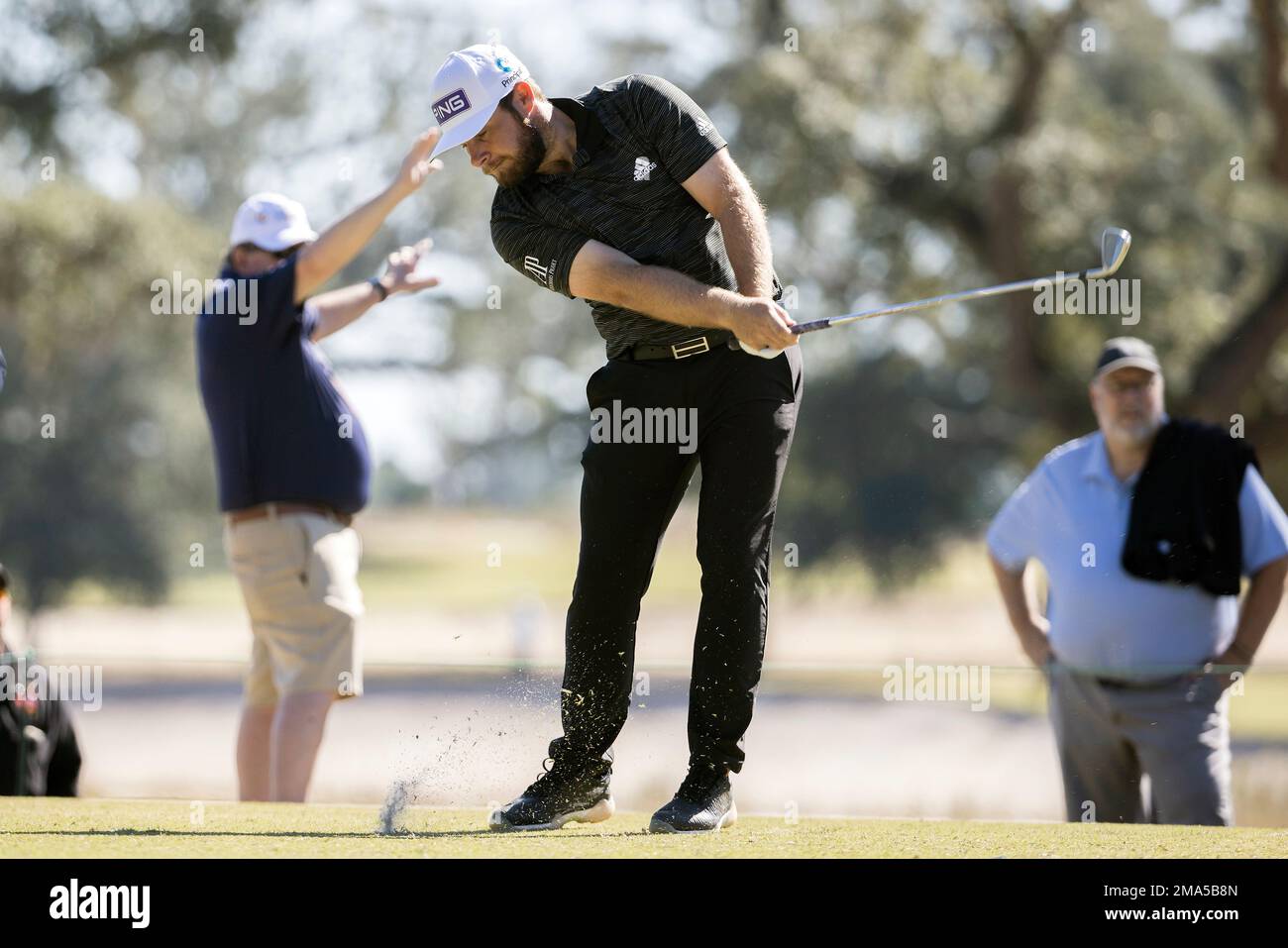 Tyrrell Hatton of England hits off the 10th tee during the second round ...