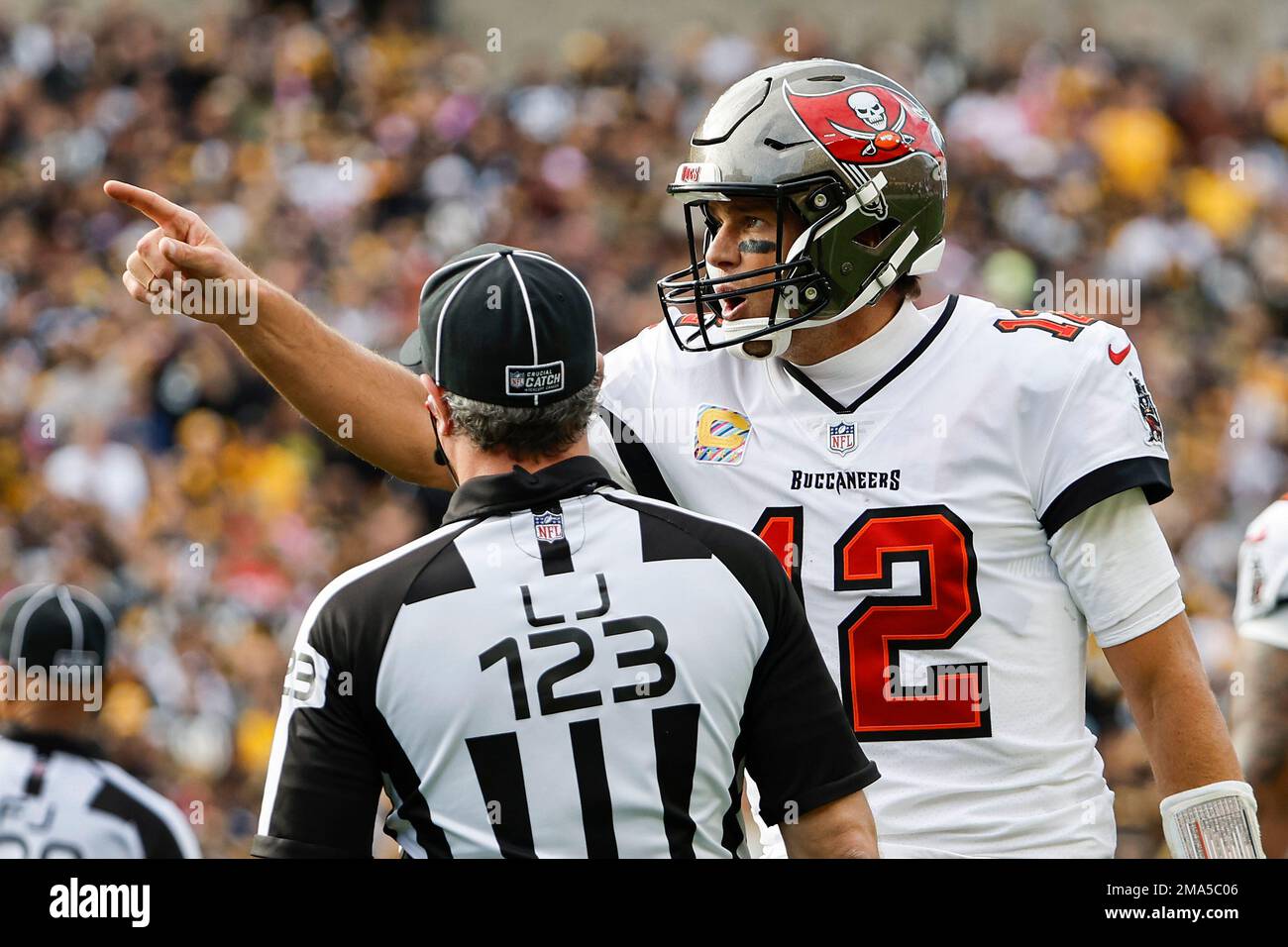Tampa Bay Buccaneers quarterback Tom Brady talks to line judge Mike ...