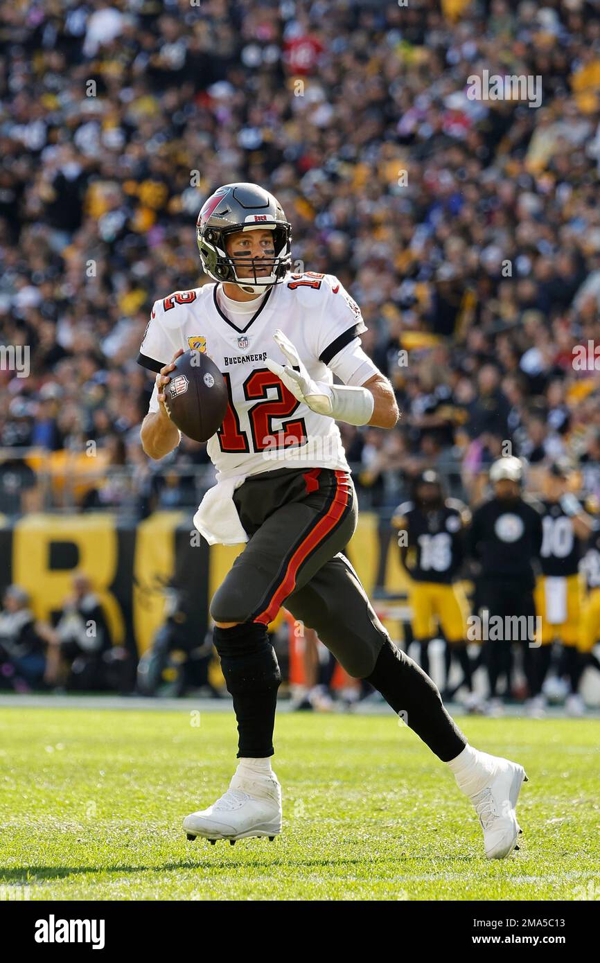 Tampa Bay Buccaneers quarterback Tom Brady rolls out during an NFL ...