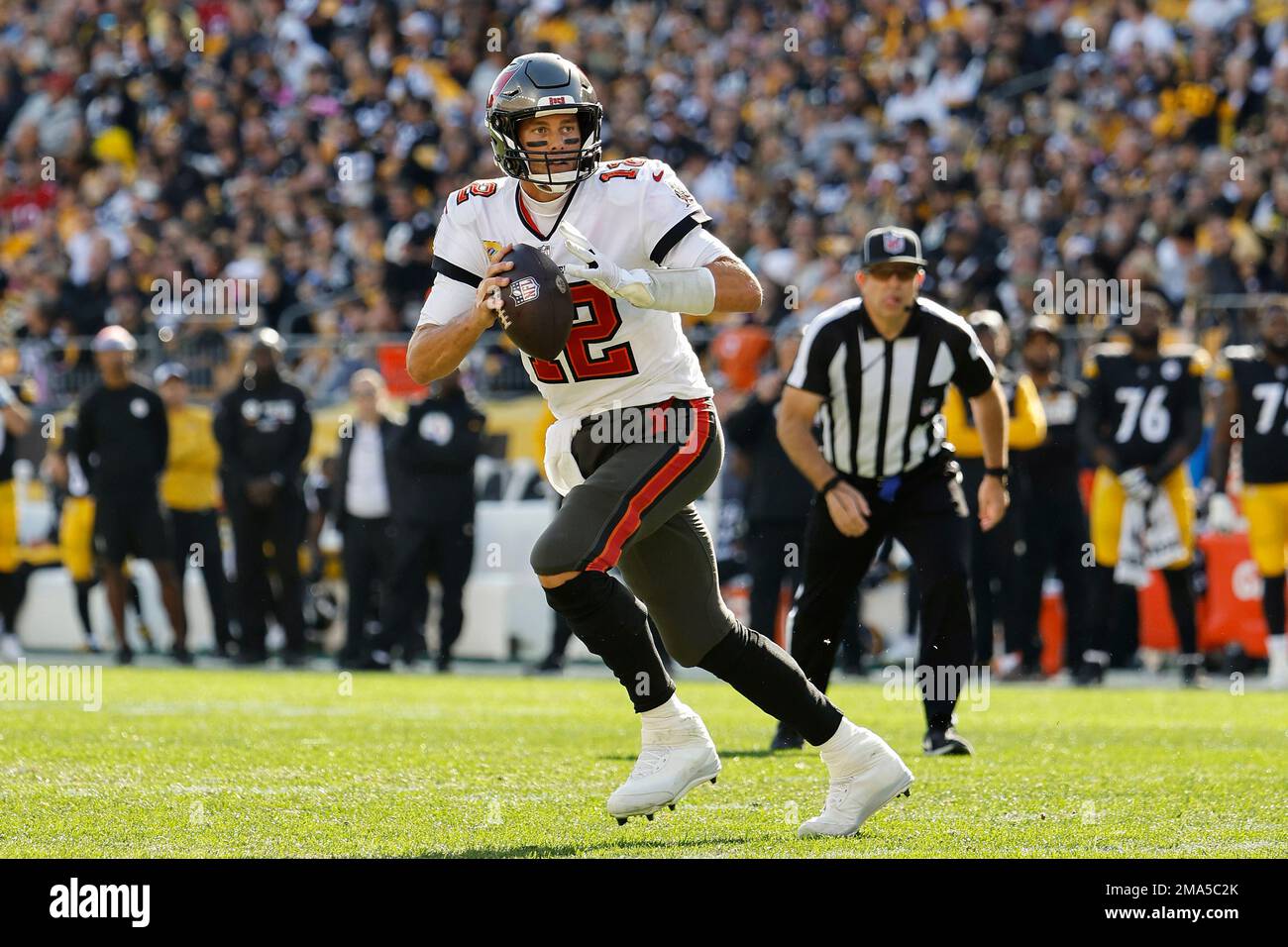 Tampa Bay Buccaneers quarterback Tom Brady rolls out during an NFL ...