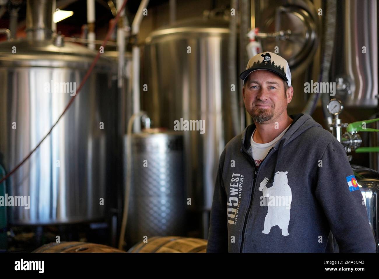 Eric Seufert, owner and manager of 105 West Brewing Co., poses for a ...