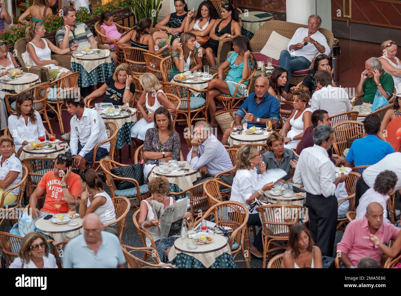 People sitting at tables in a bar in the famous hi-res stock ...