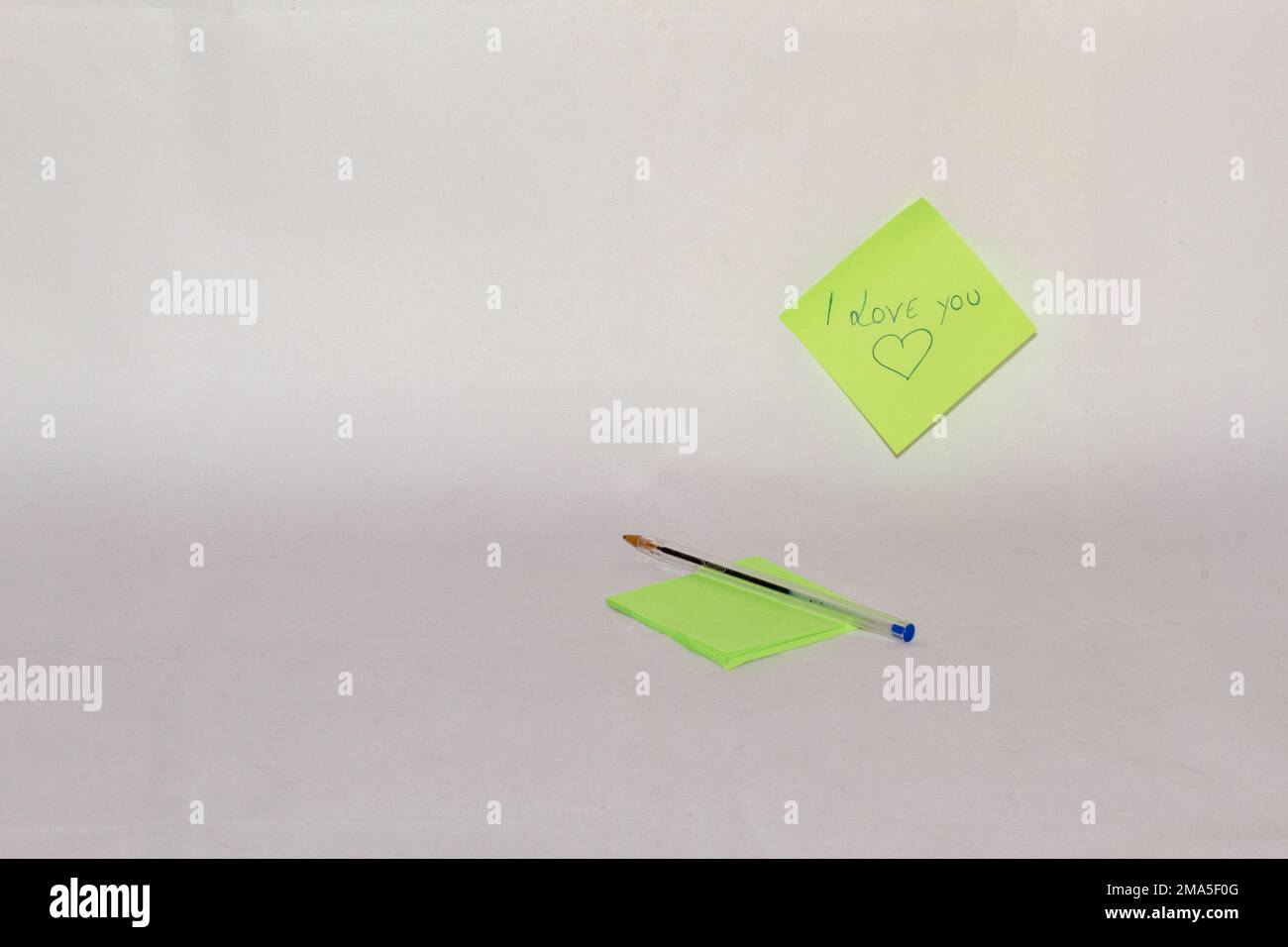 Note in which I love you is written by a lover on a small green sheet ...