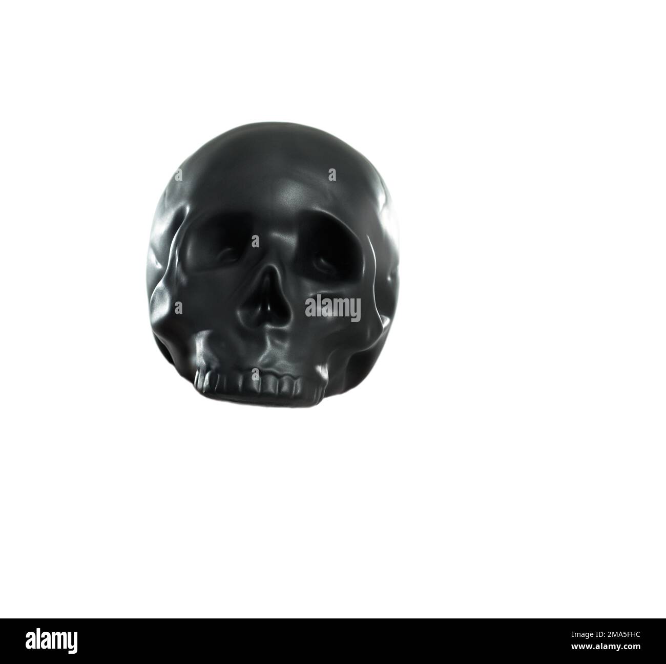 Human skull toy, studio and white background for halloween celebration ...