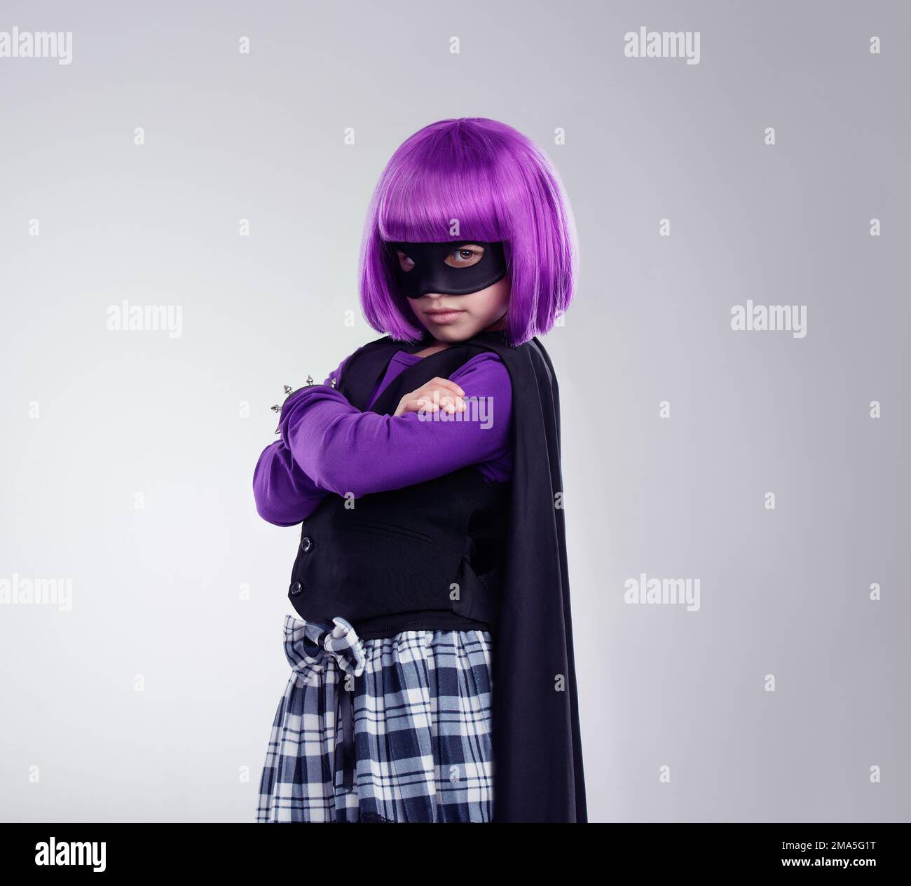 Portrait, girl and mask for costume, hero and confident kid isolated on ...